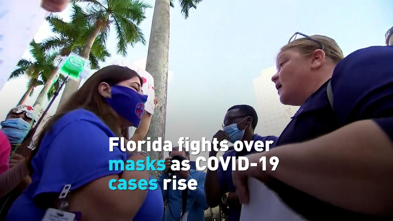 Florida fights over masks even as COVID-19 cases and deaths spike - CGTN
