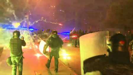 Lebanon's protesters use fireworks during clashes outside parliament - CGTN